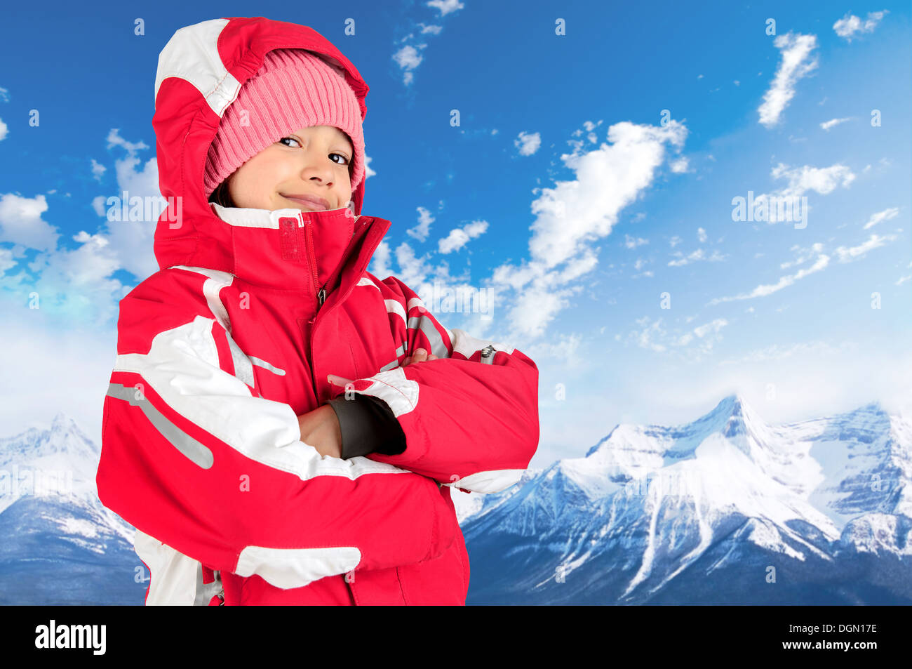 Young girl posing in winter clothing in the mountains Stock Photo - Alamy