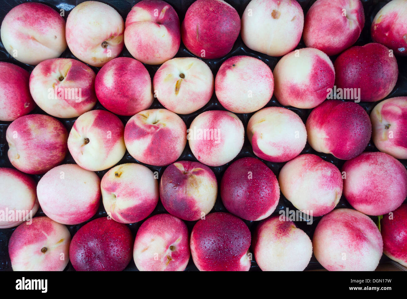 A display of white flesh Nectarines in a greengrocers shop Stock Photo ...
