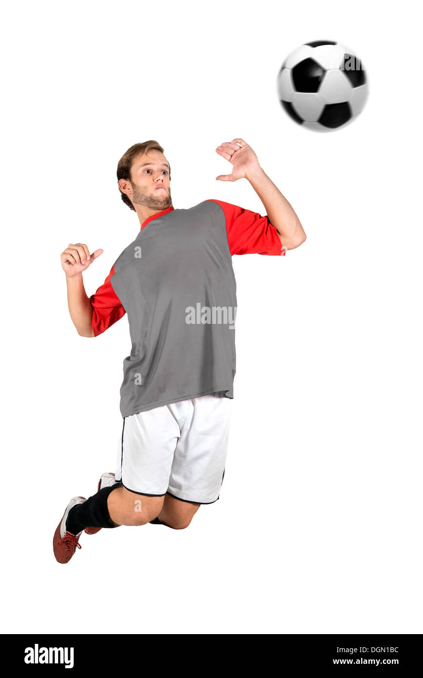 Football player with a ball isolated in white Stock Photo - Alamy