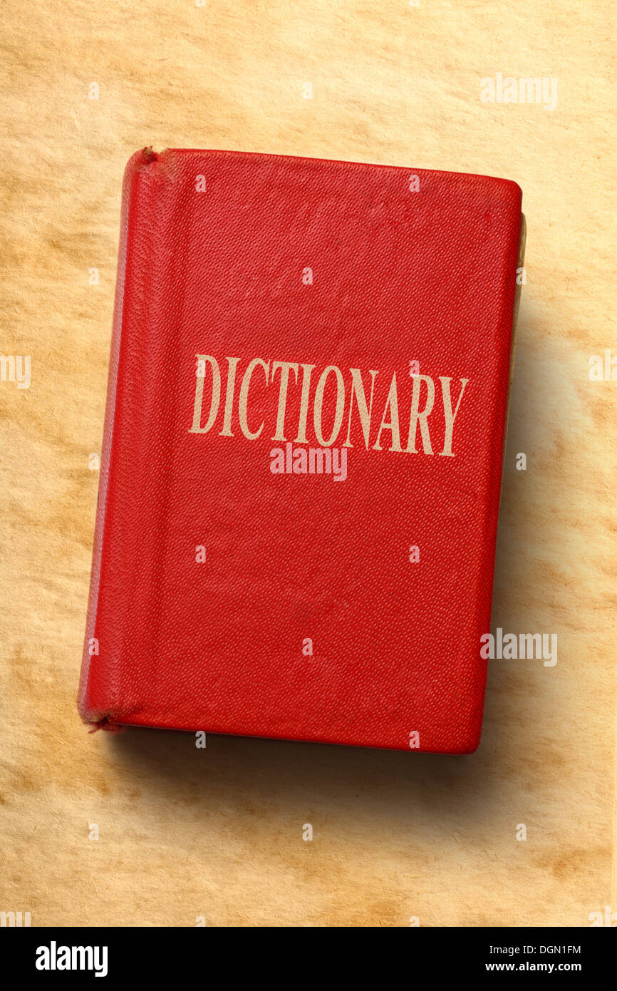 Old dictionary on paper background Stock Photo - Alamy