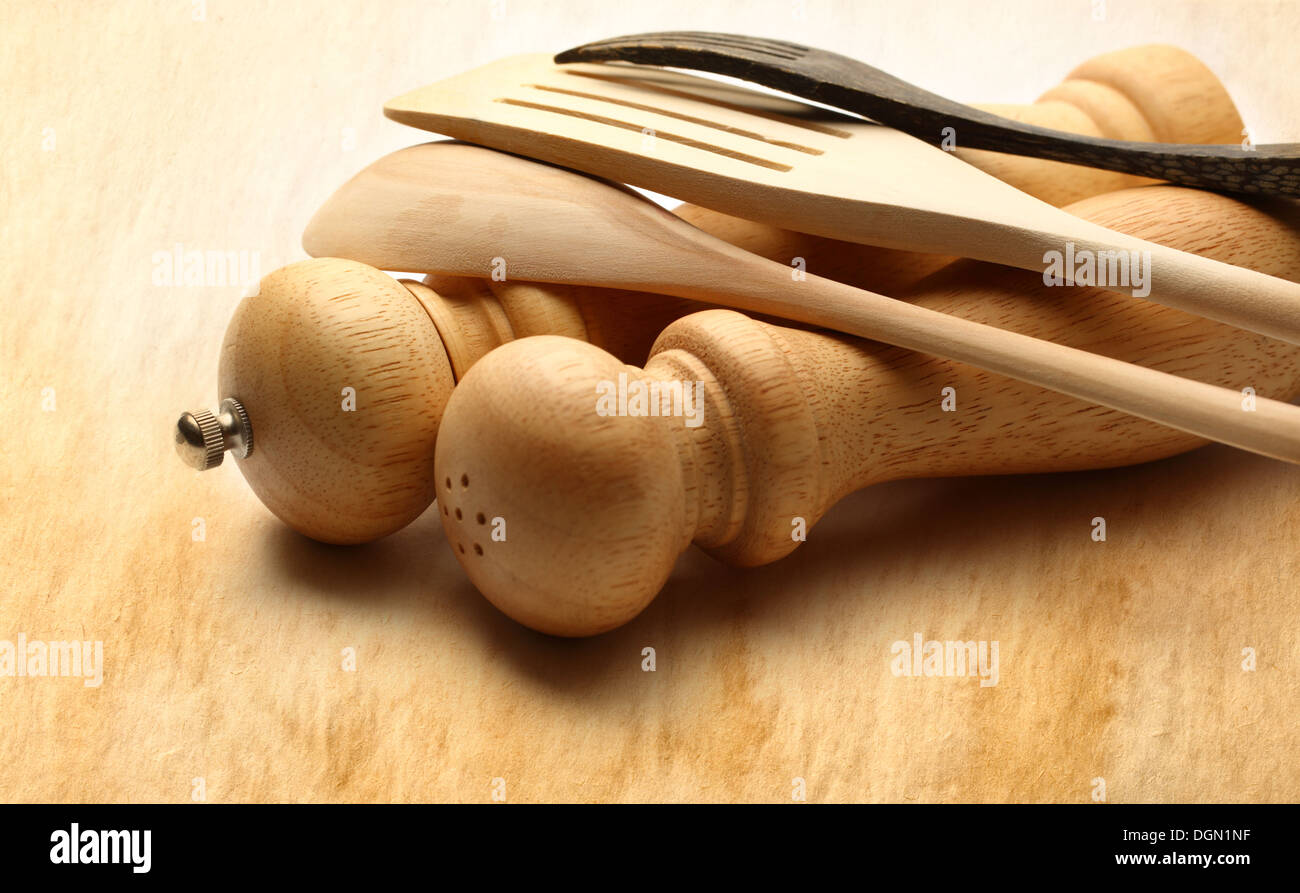 Wooden salt and pepper set with kitchen utensils Stock Photo - Alamy