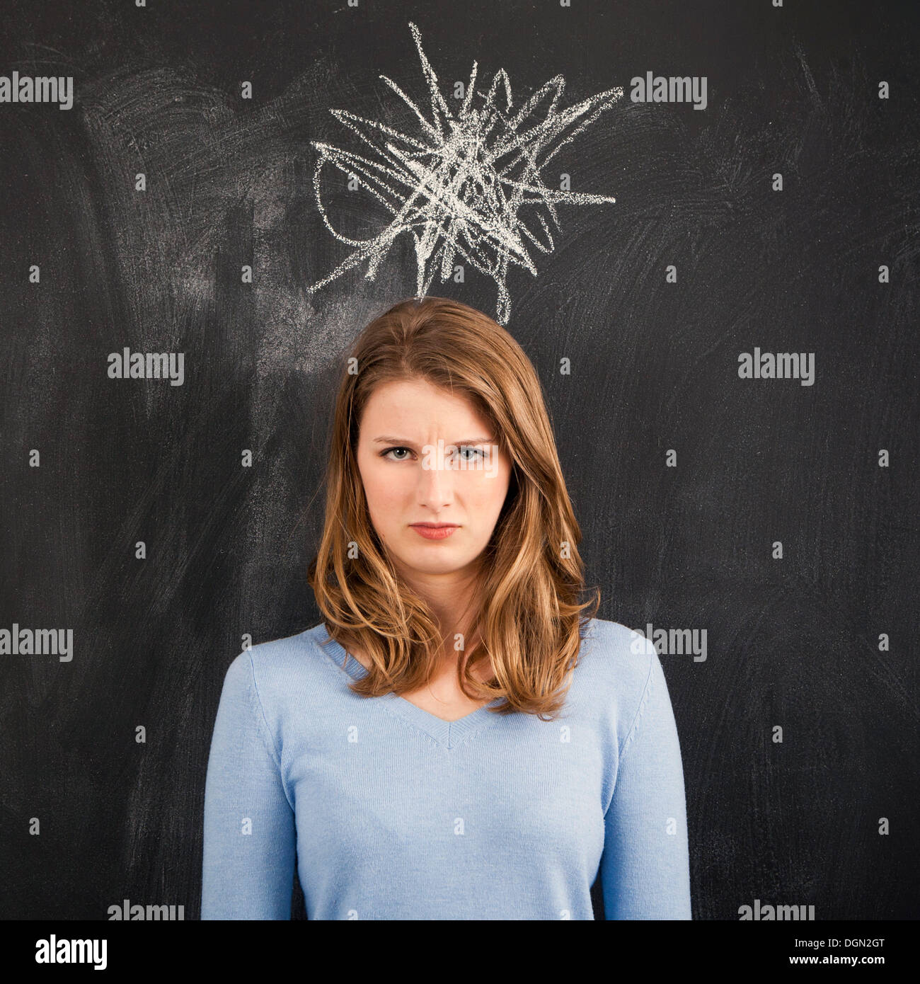 Studio portrait of woman with chalk drawing Stock Photo - Alamy