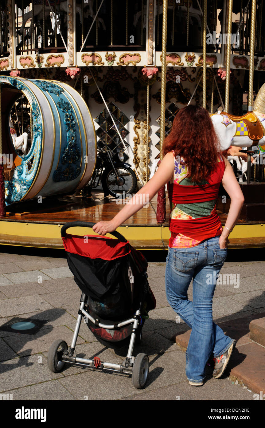 Woman and pushchair hi-res stock photography and images - Alamy