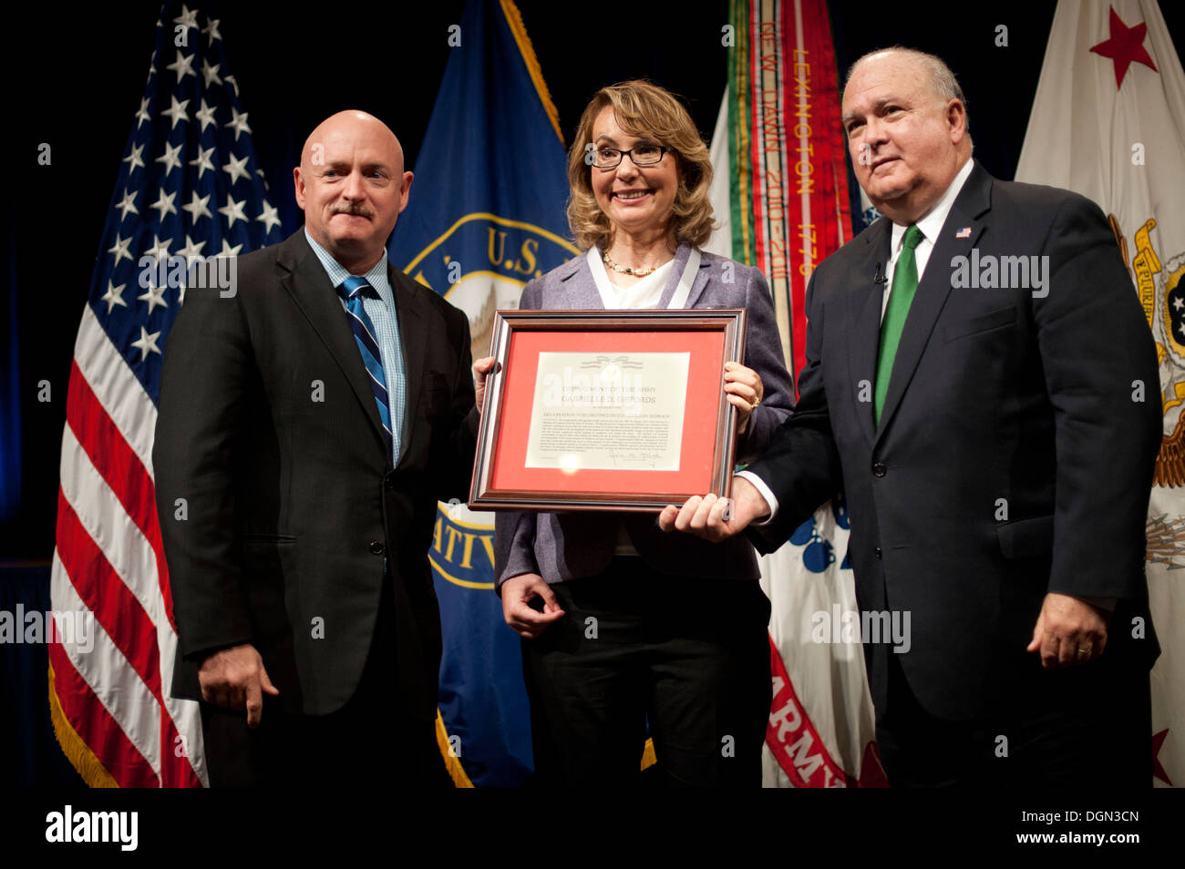 Under Secretary of the Army Joseph W. Westphal (far right) presents the ...