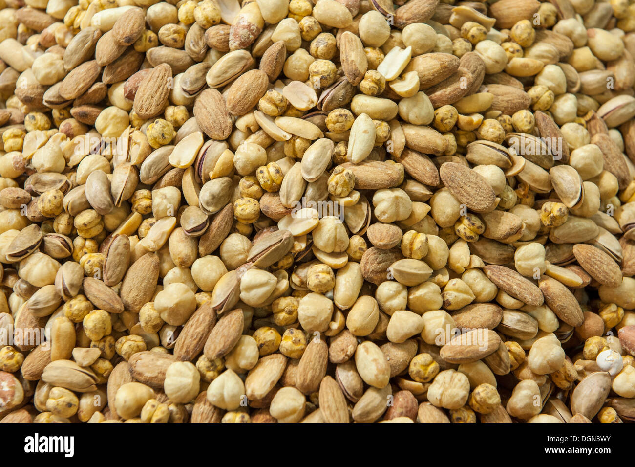 Mixed nuts background Stock Photo - Alamy