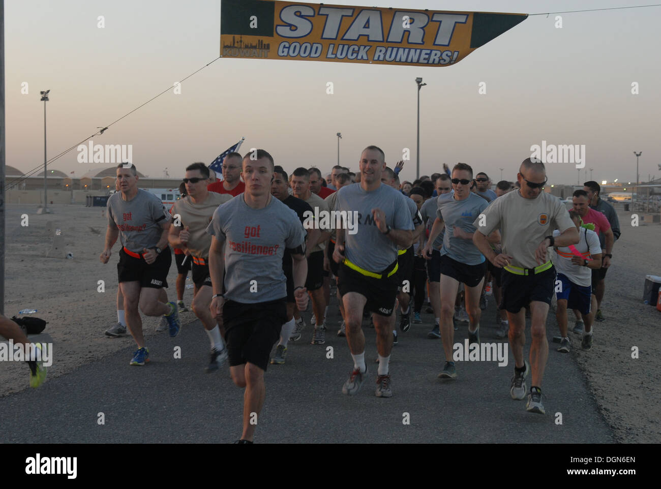Soldiers begin running at the start line of the shadow run of the ...