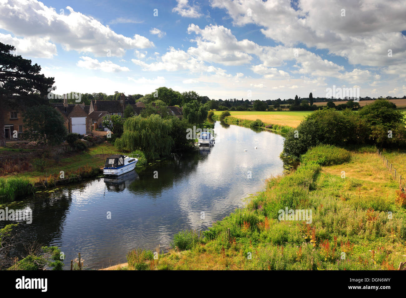 Summer, boat on the river Nene, Wansford village, Cambridgeshire County ...