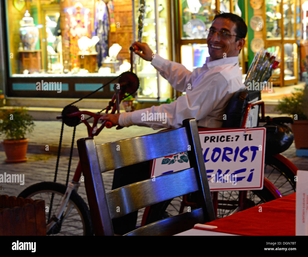 The disabled flower-seller Stock Photo - Alamy