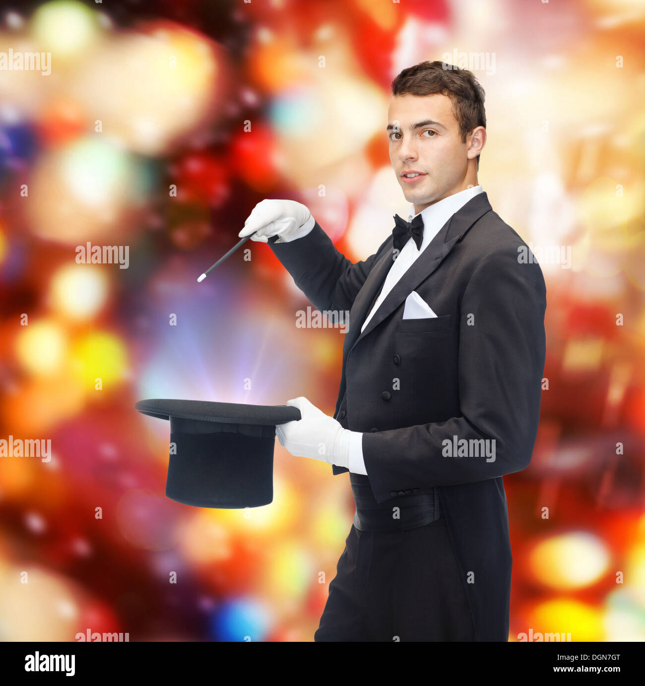 magician in top hat with magic wand showing trick Stock Photo - Alamy