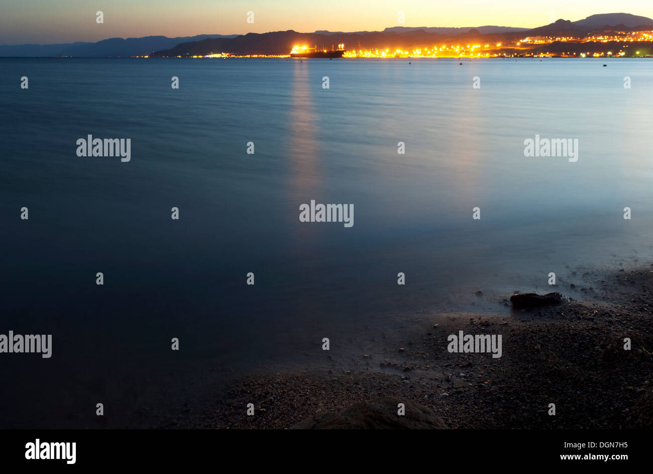 Late evening beach scene Stock Photo - Alamy