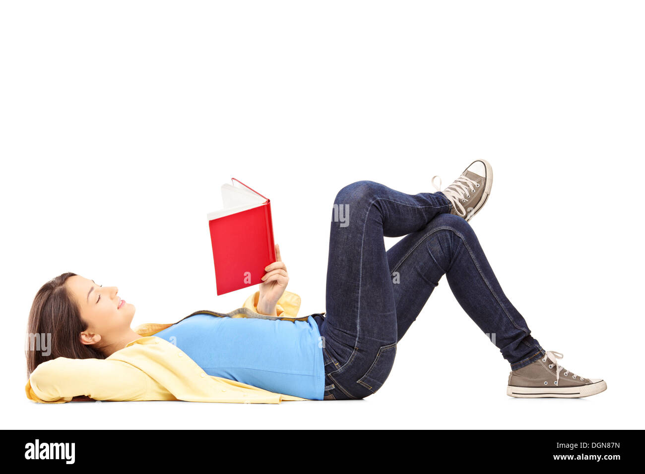 Positive female smiling reading Cut Out Stock Images & Pictures - Alamy