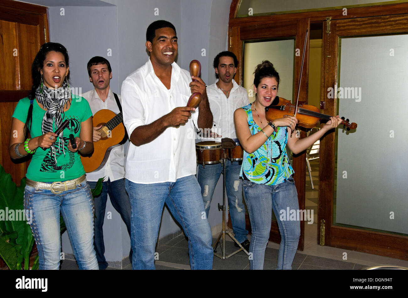 Typical Cuban musician group seranade tourist group at lunch Stock ...