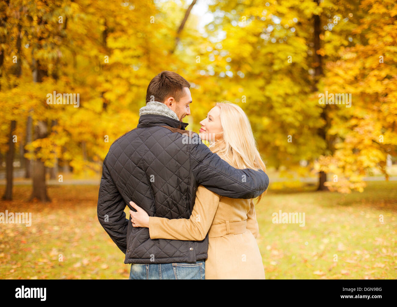 romantic couple kissing in the autumn park Stock Photo - Alamy