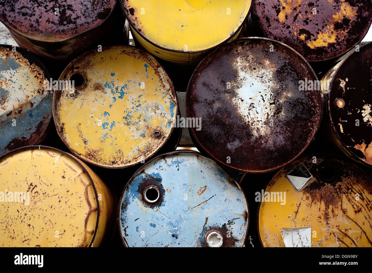 Pile of old rusty oil barrels Stock Photo - Alamy