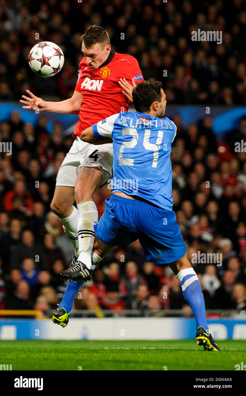 Manchester, UK. 23rd Oct, 2013. Man Utd Defender Phil Jones gets a ...