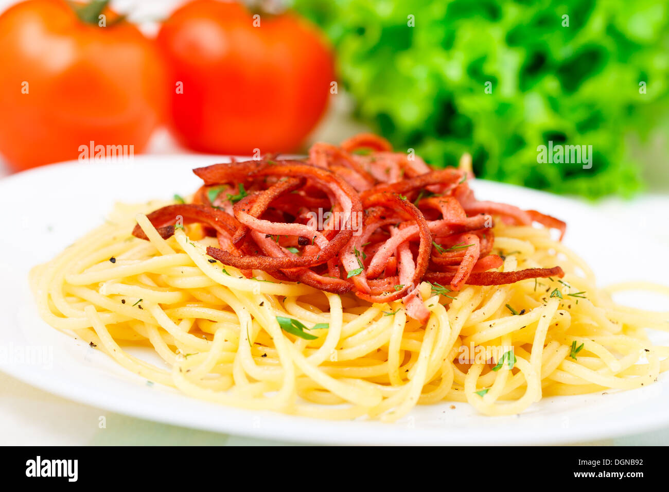 Spaghetti with fried ham Stock Photo - Alamy
