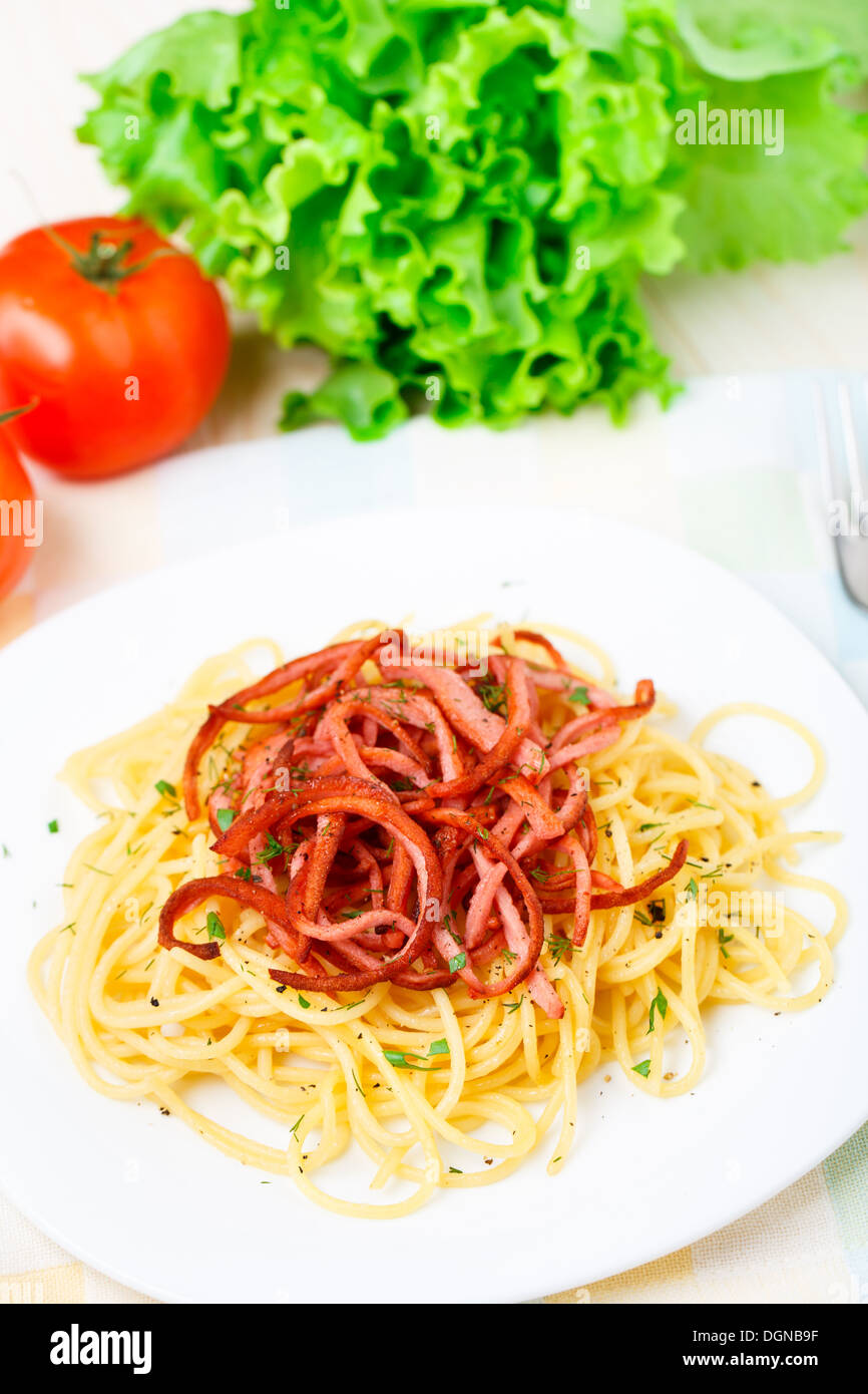 Spaghetti with fried ham Stock Photo - Alamy