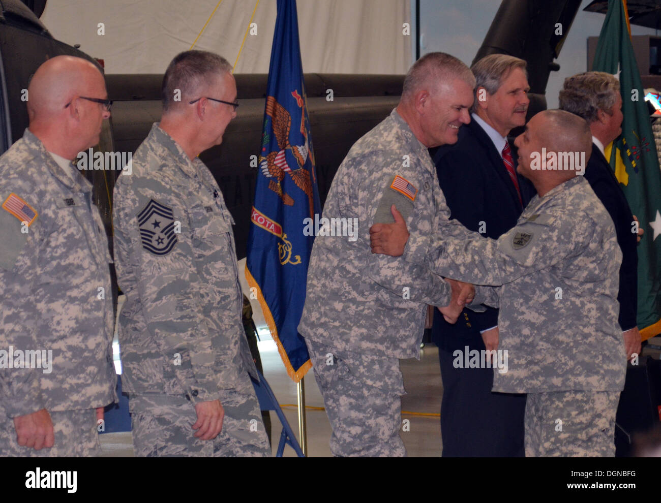 Maj. Gen. David Sprynczynatyk (center), North Dakota adjutant general ...