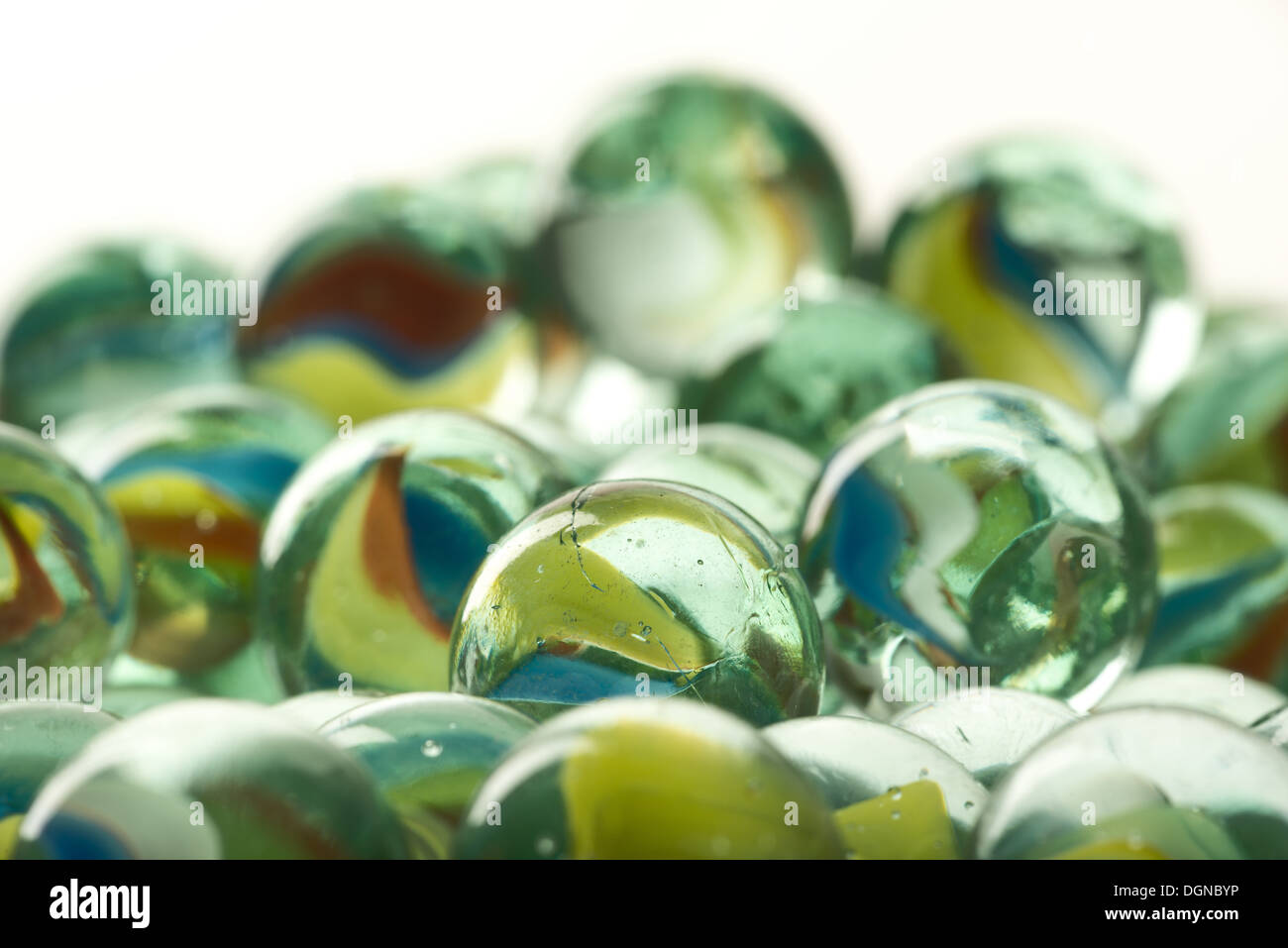 collection of old glass transparent marbles with unique swirls of ...