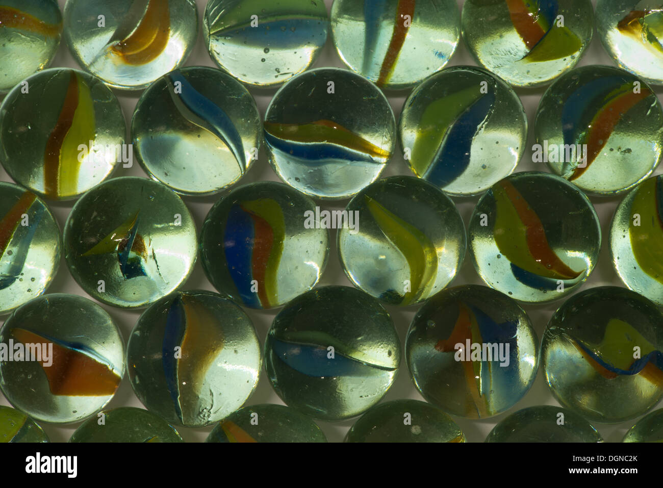 collection of old glass transparent marbles with unique swirls of ...