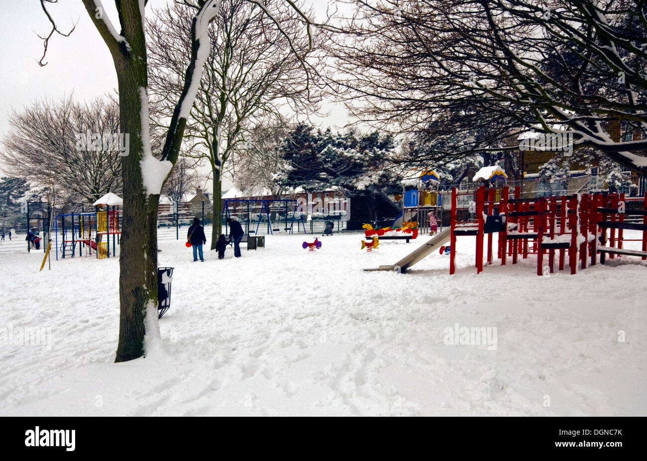 Children playing park fence hi-res stock photography and images - Alamy