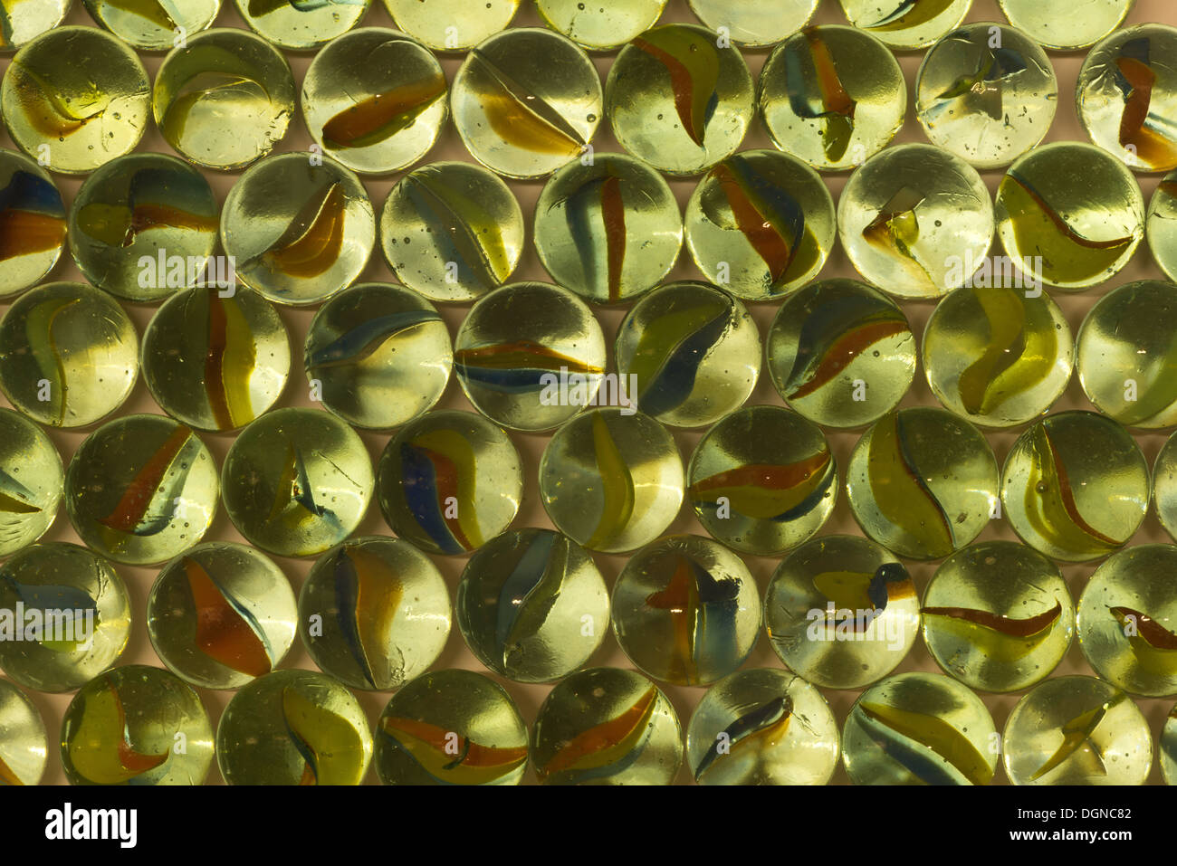 collection of old glass transparent marbles with unique swirls of ...