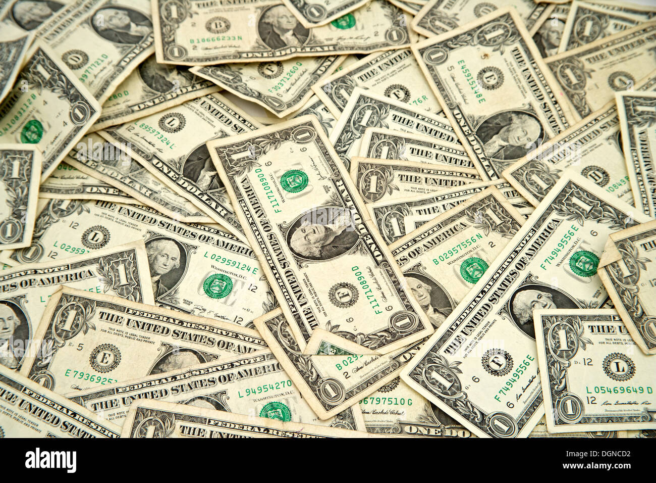 Pile of American money spread out Stock Photo - Alamy