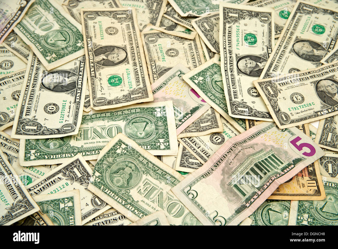 Pile of American money spread out Stock Photo - Alamy