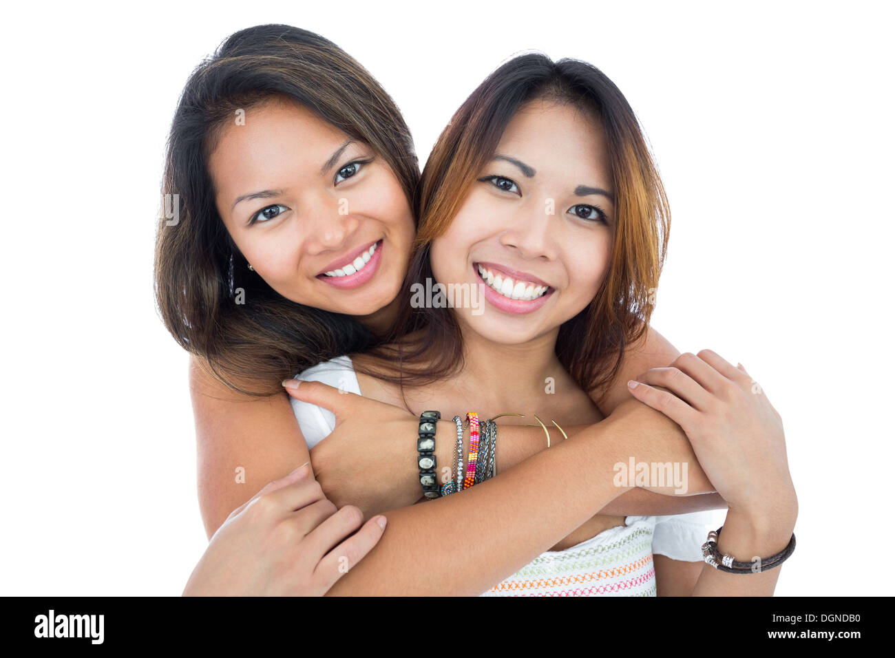 Two sisters hugging in hi-res stock photography and images - Alamy