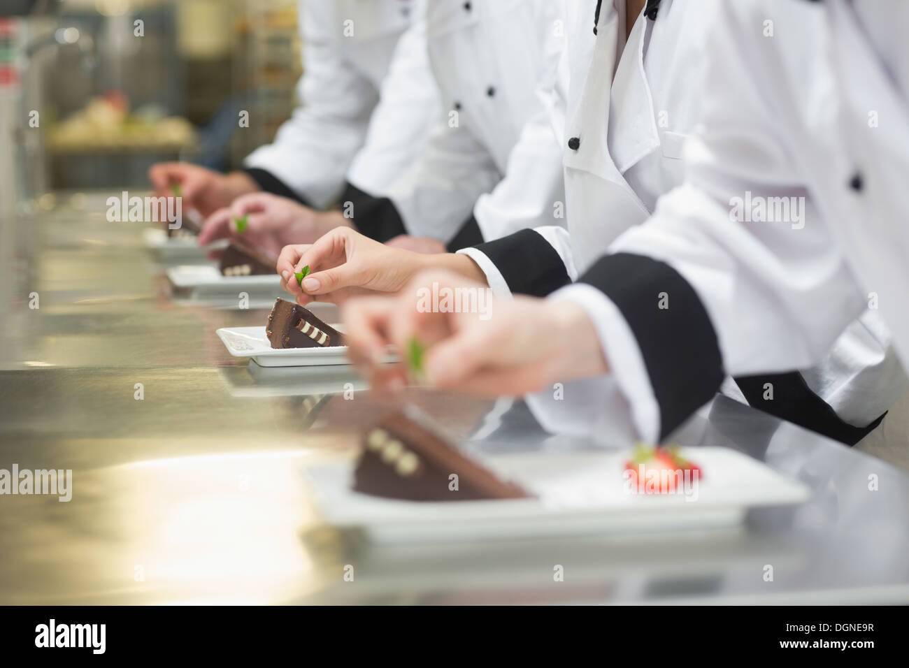 Cake team building hi-res stock photography and images - Alamy