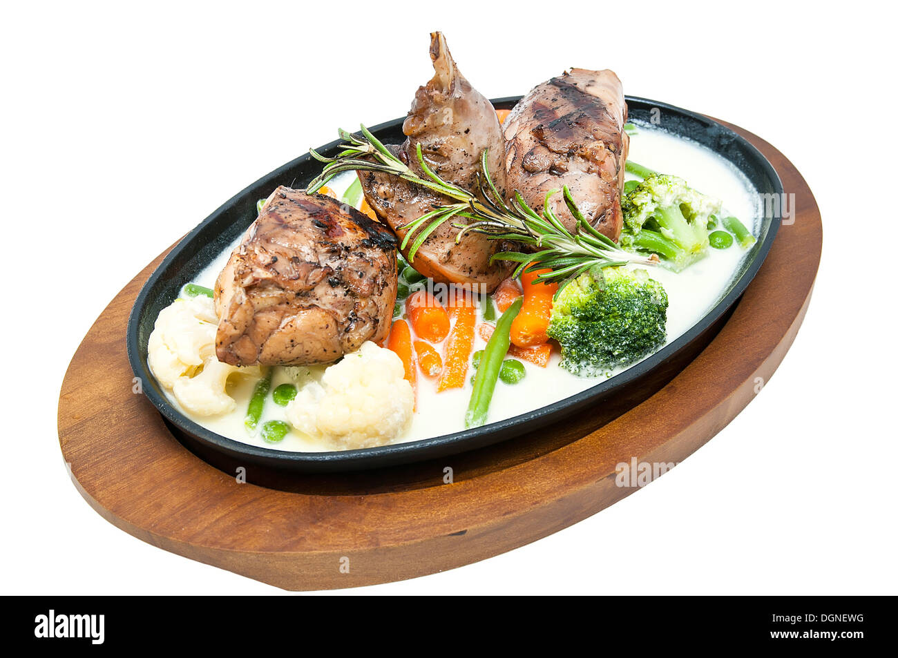 roasted rabbit meat and potatoes with vegetables Stock Photo - Alamy