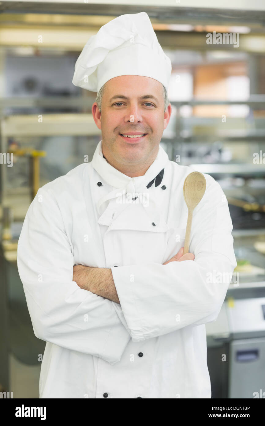 Mature head chef smiling at camera Stock Photo - Alamy