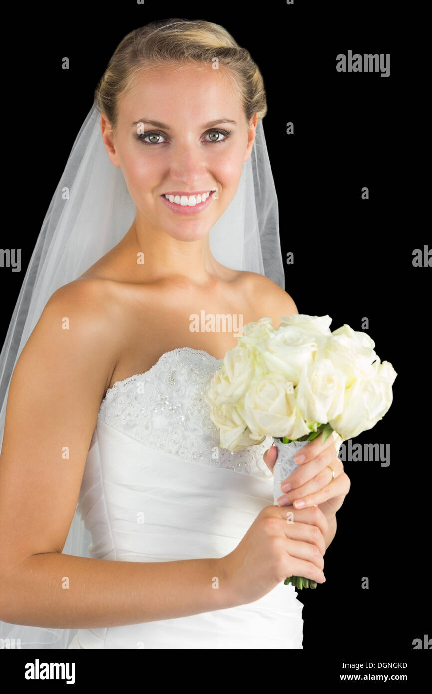 Lovely bride posing smiling at camera Stock Photo - Alamy