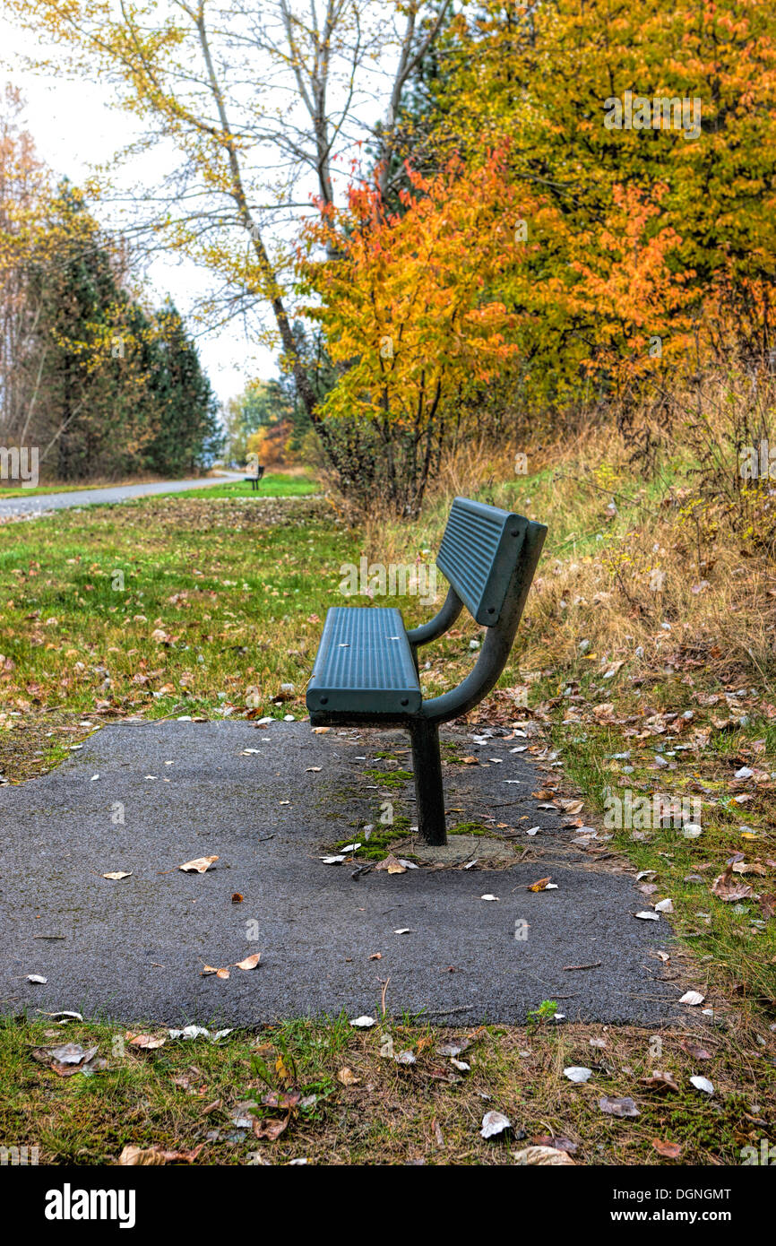 Empty park bench Stock Photo - Alamy