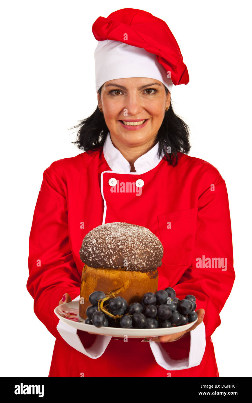 Chef woman giving sponge cake with grapes isolated on white background ...