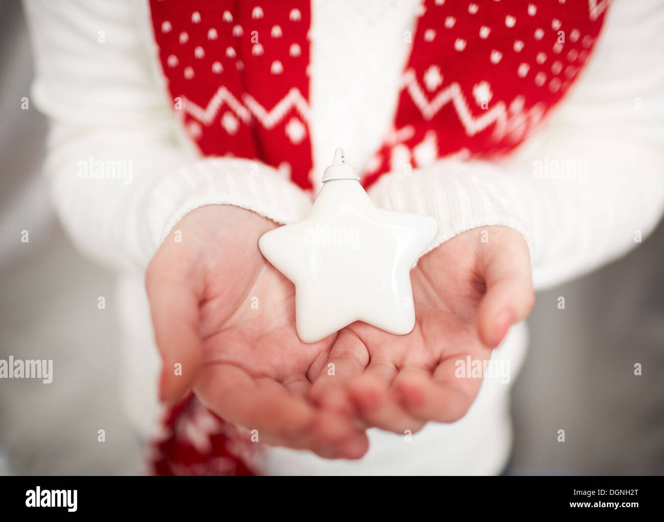 Image of decorative toy star on female hands Stock Photo - Alamy