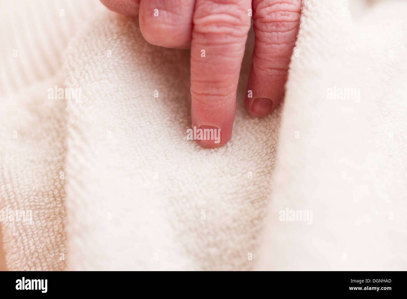 hand of new born baby in close up. vertical image Stock Photo - Alamy