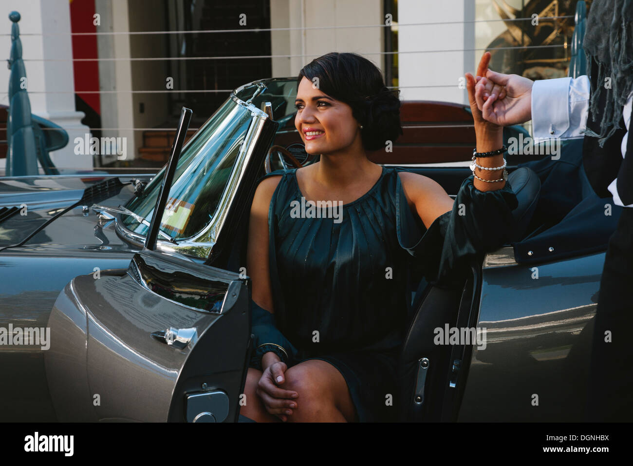 Young woman being escorted out of her vehicle Stock Photo - Alamy