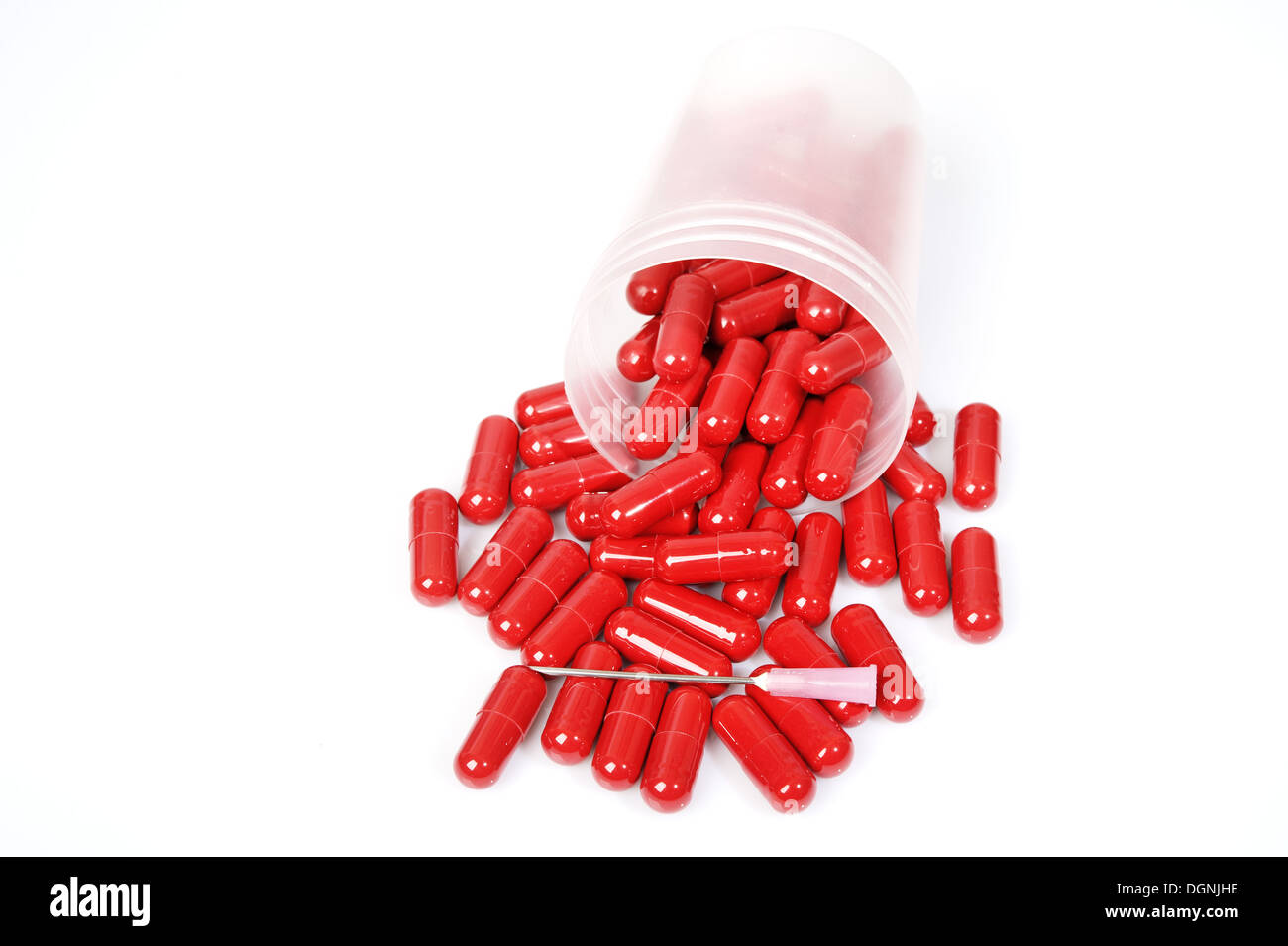 Red capsules, vitamin Stock Photo - Alamy