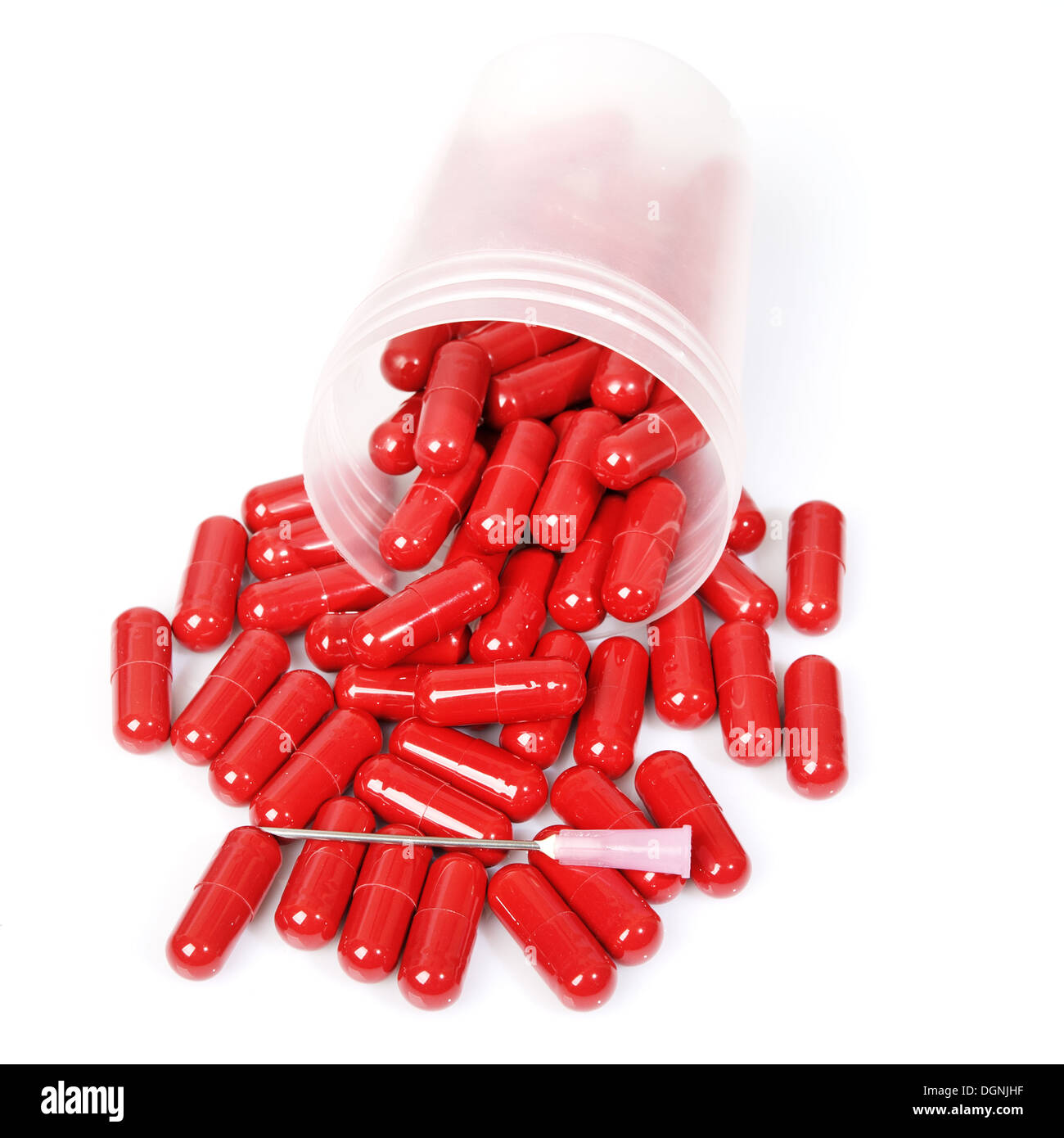 Red capsules, vitamin Stock Photo - Alamy
