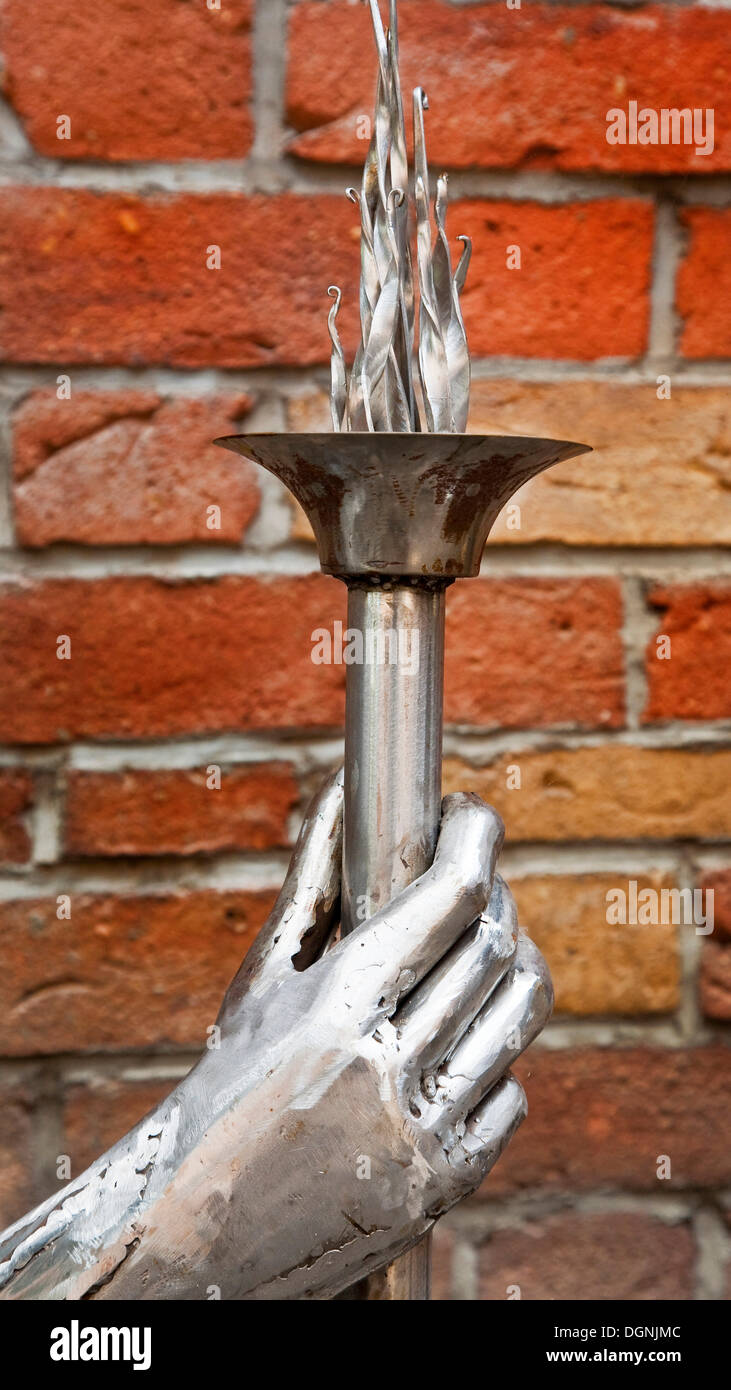 Hand holding a burning torch hi-res stock photography and images - Alamy