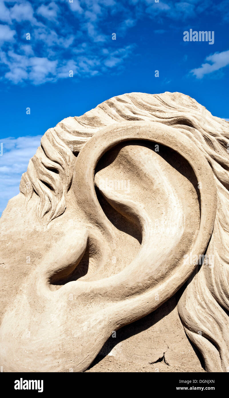 Ear, detail of a sand sculpture at the Sand Sculpture Festival, Berlin ...