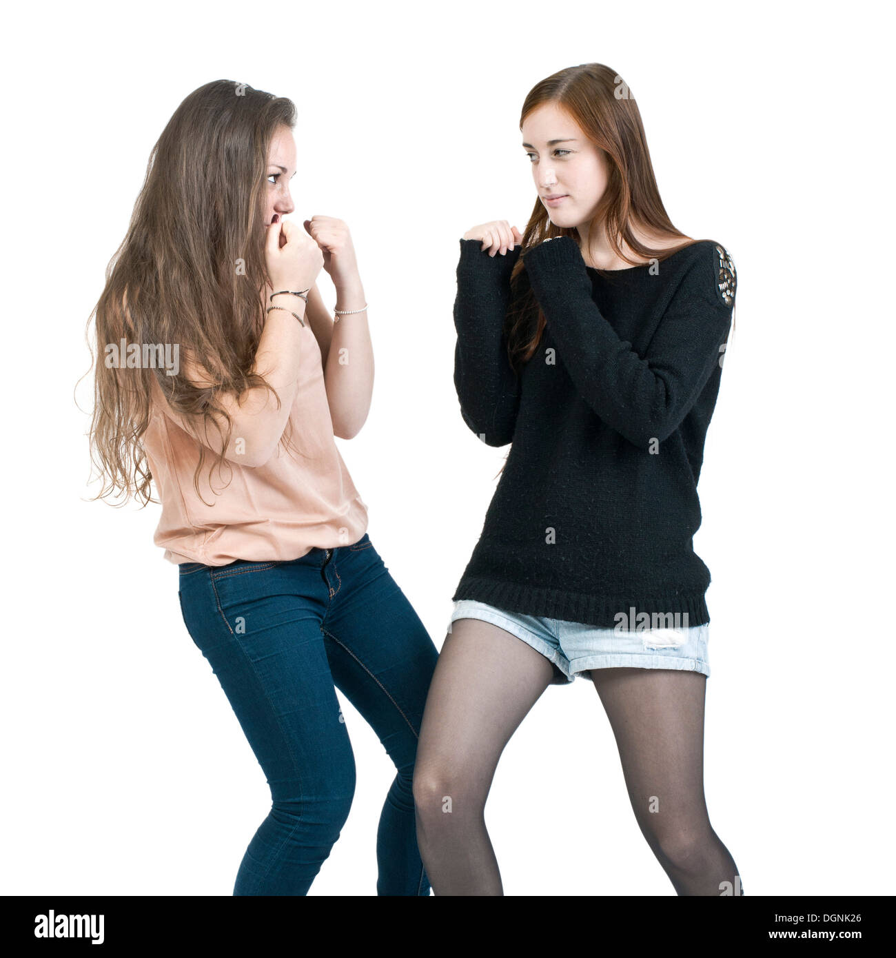Two young women having funny fight Stock Photo - Alamy