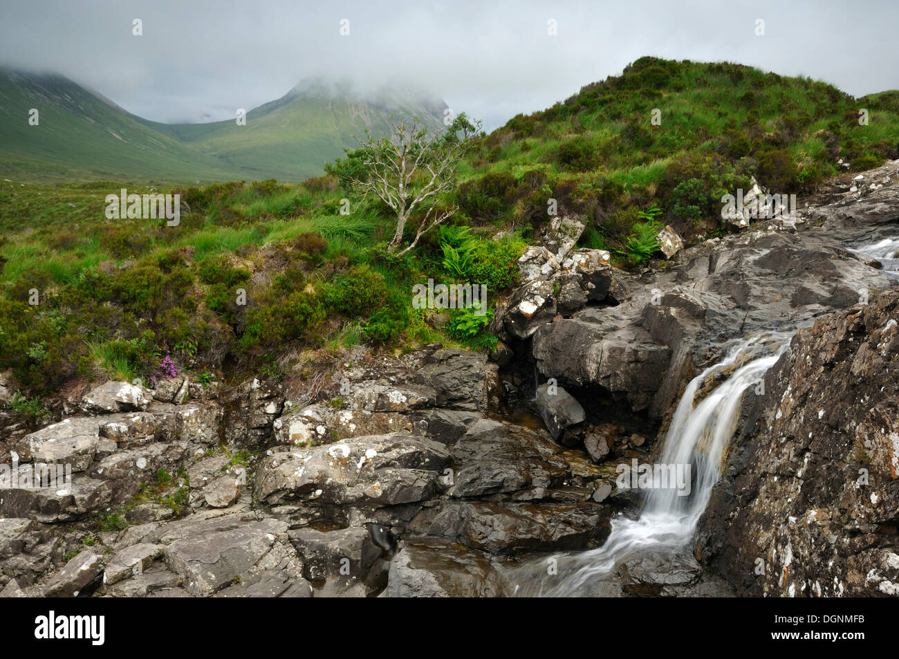 Sgurr nan Gillean from Sligachan, waterfalls in a mountainous landscape ...