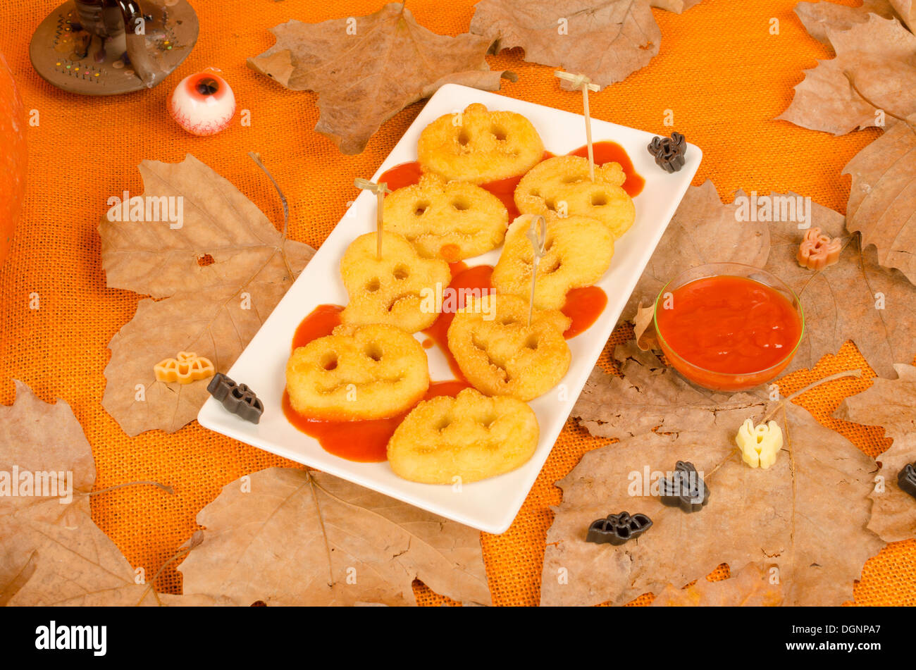 Halloween kid party snack, crunchy potato appetizer in spooky shapes ...