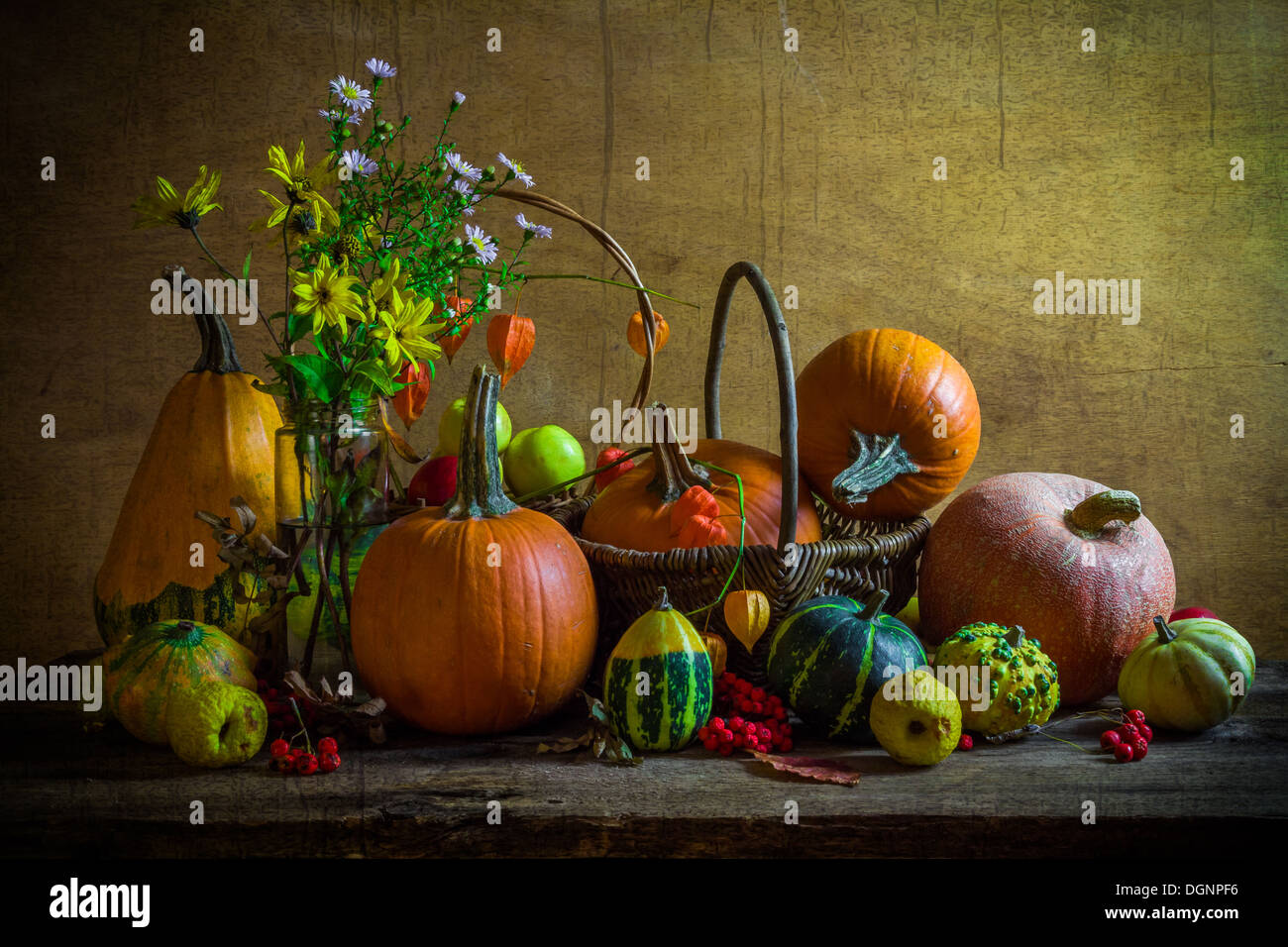 Autumnal Halloween still life with pumpkins, rowan and quinces Stock ...