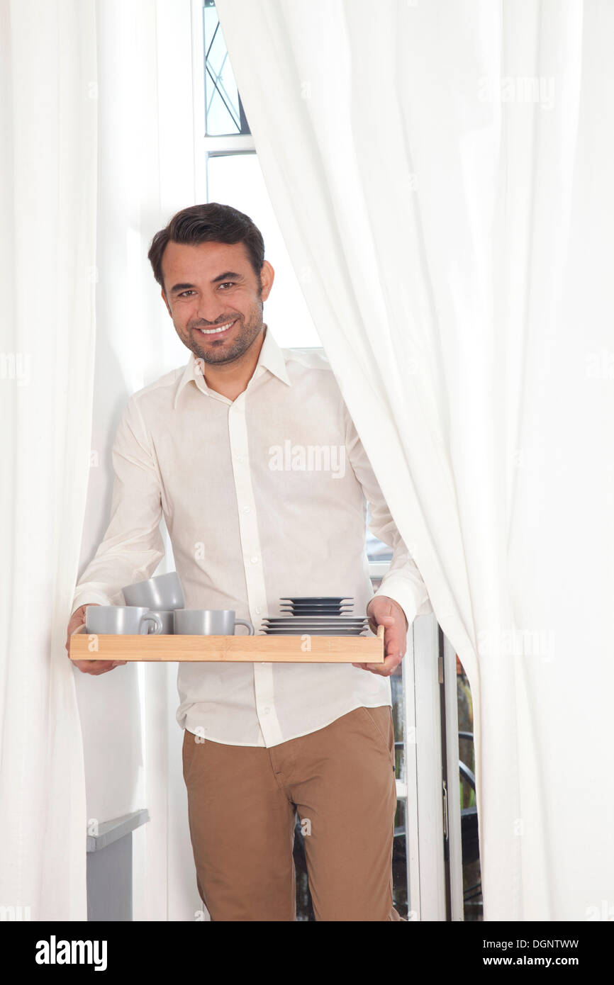 Man carrying tray cups hi-res stock photography and images - Alamy