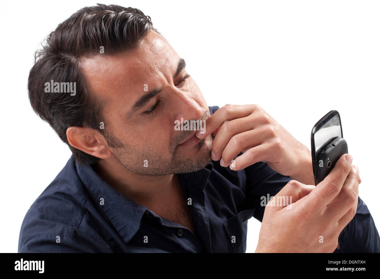 Man looking at a mobile phone Stock Photo - Alamy