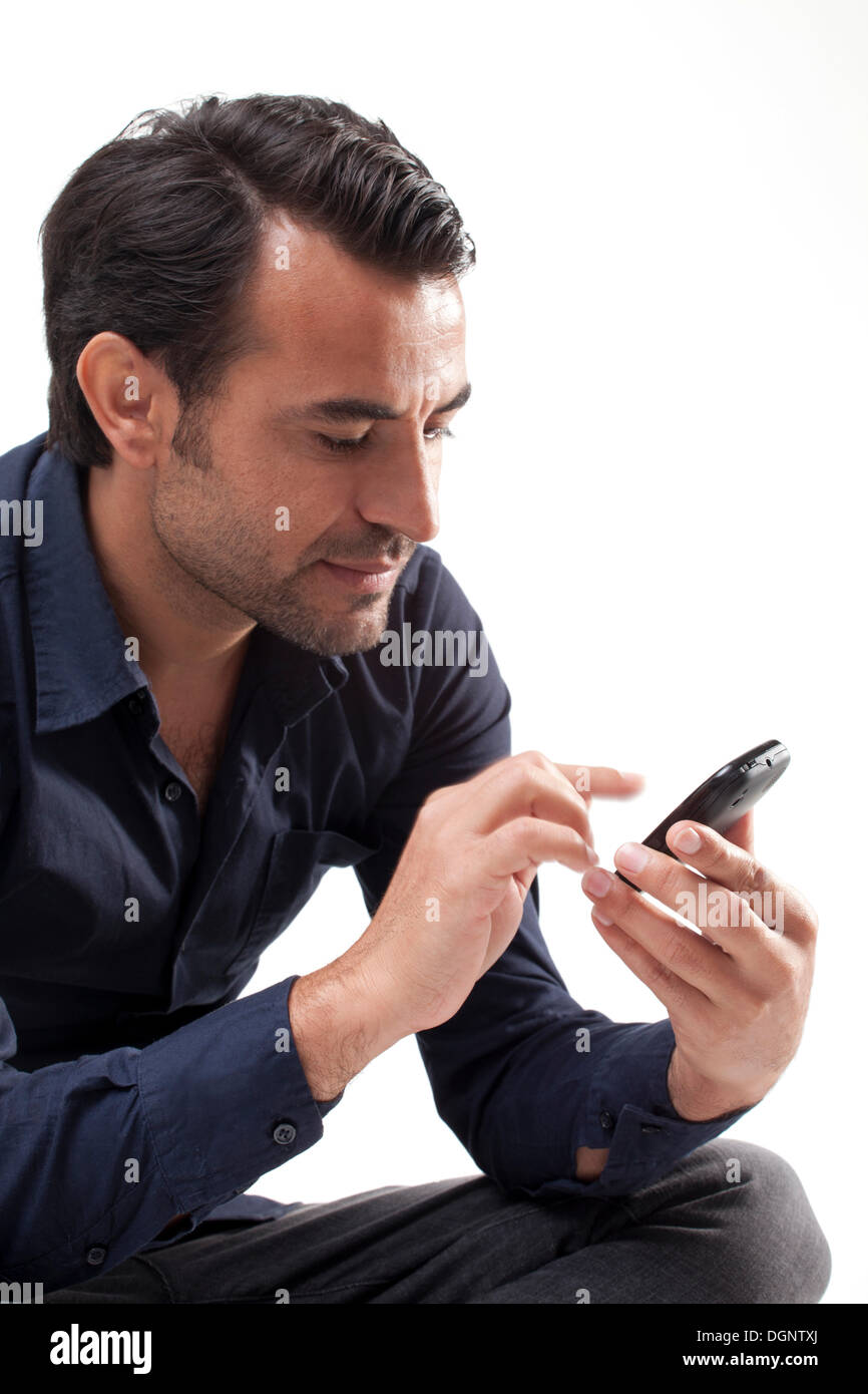 Man typing on a mobile phone Stock Photo - Alamy