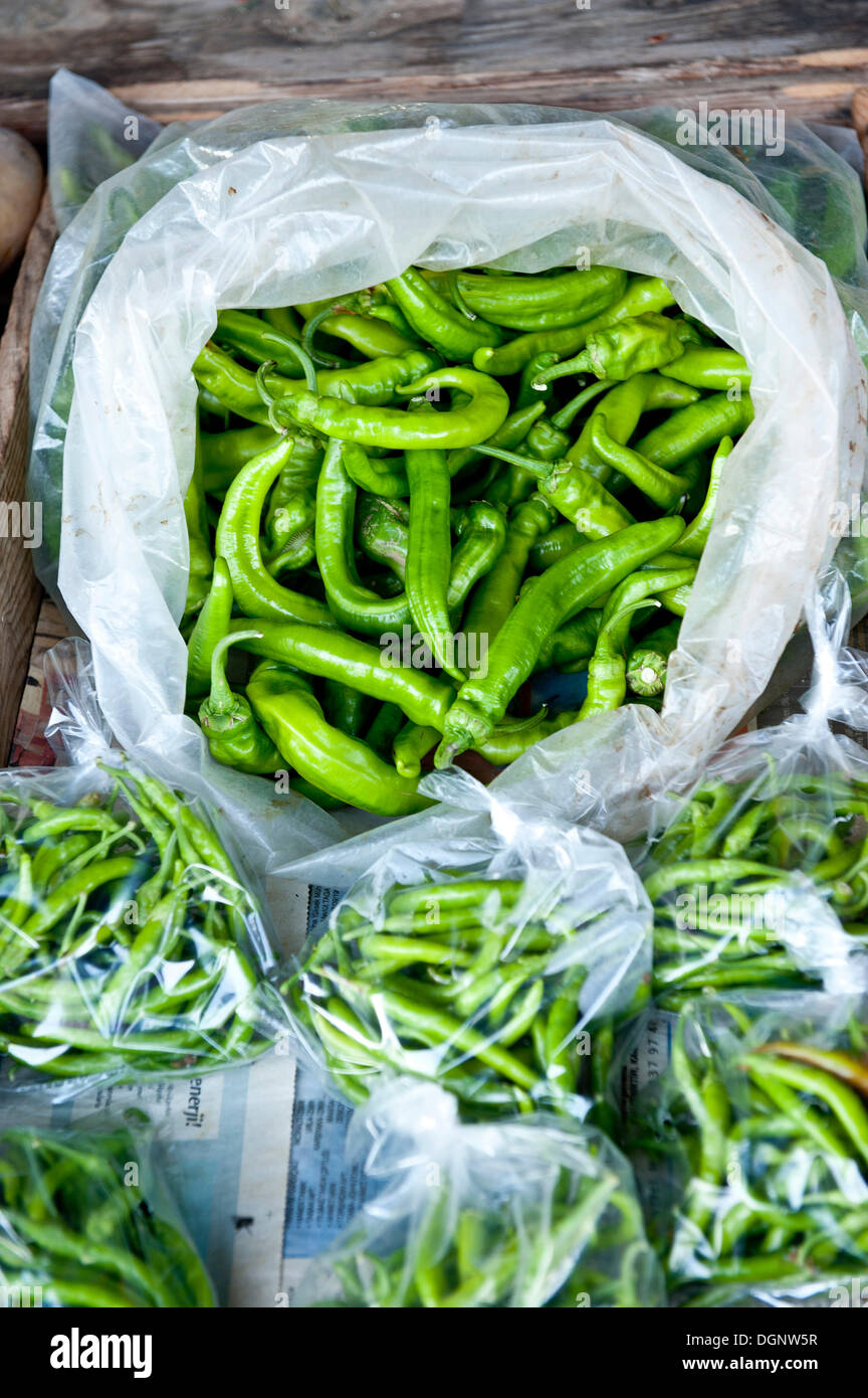 Fresh green chilis on sale at the market in plastic bags, Turkey Stock ...